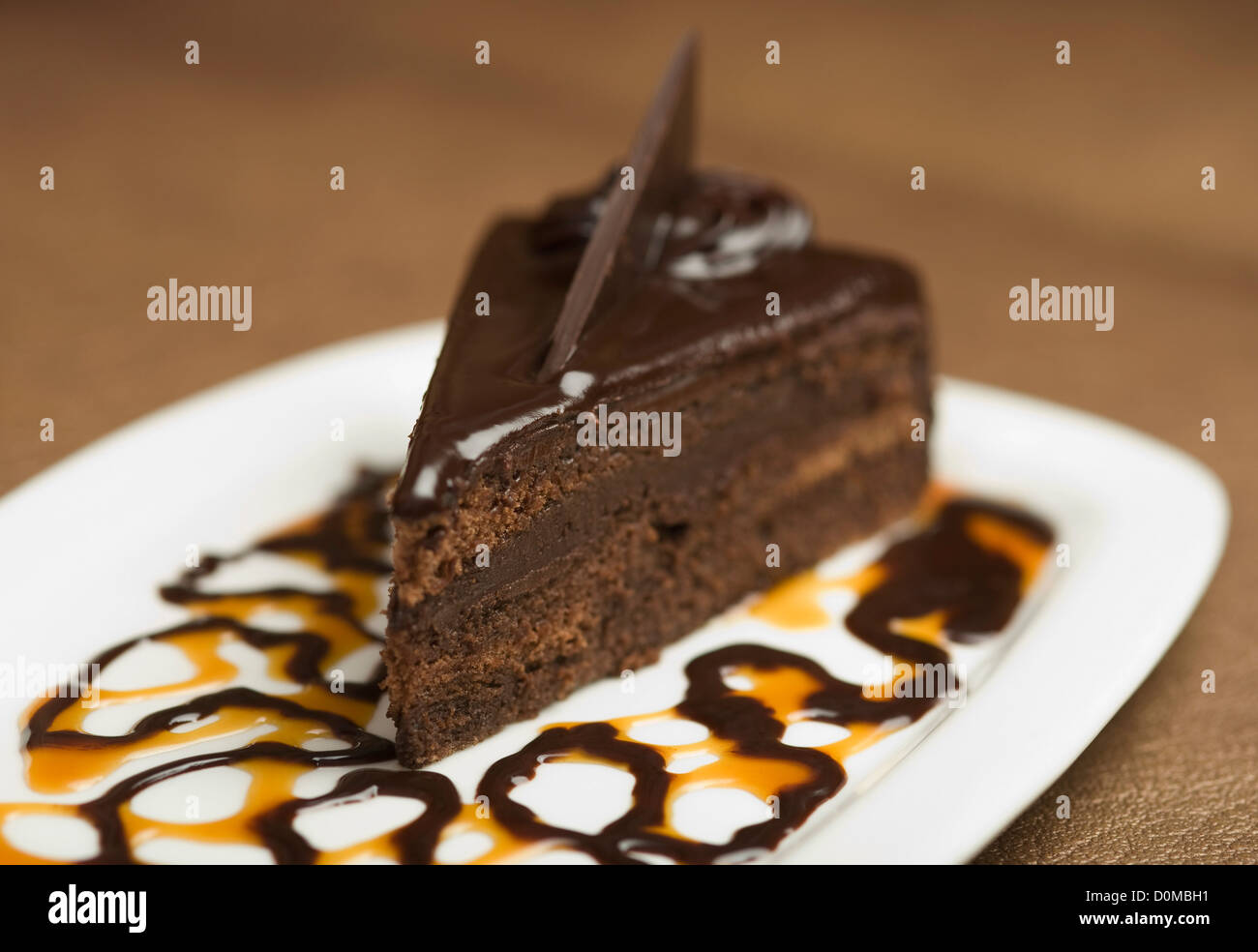 Chocolate truffle pastry served on a tray Stock Photo - Alamy
