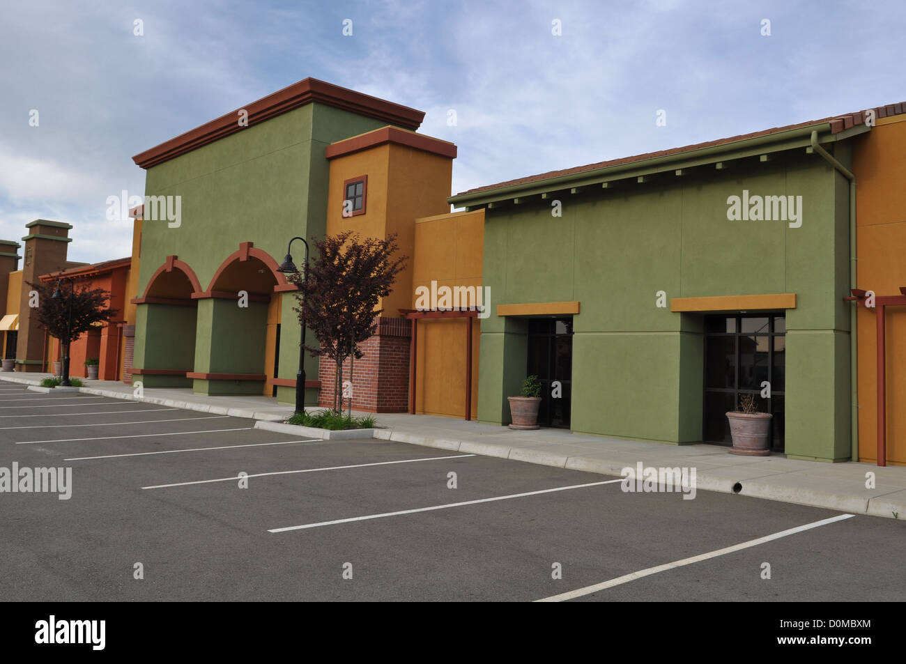 New Green and Yellow Shopping Center Store Front Stock Photo - Alamy
