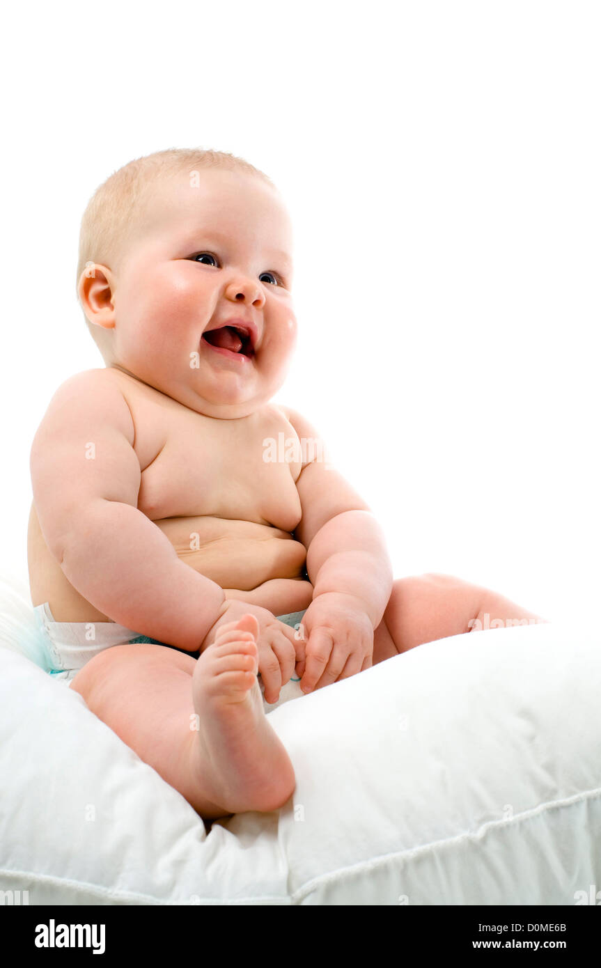 smiling baby sitting on the white background Stock Photo - Alamy
