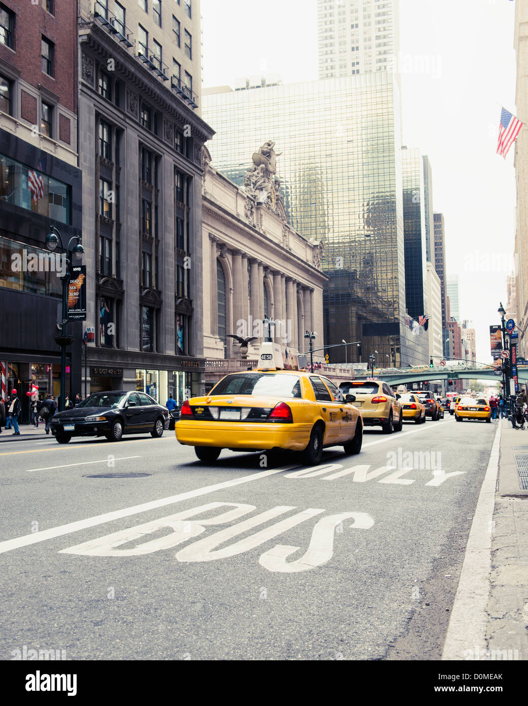 Yellow taxi on street Stock Photo - Alamy