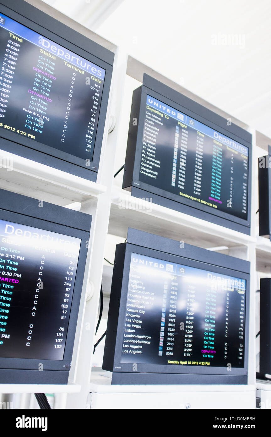 Close-up of screens at airport Stock Photo - Alamy