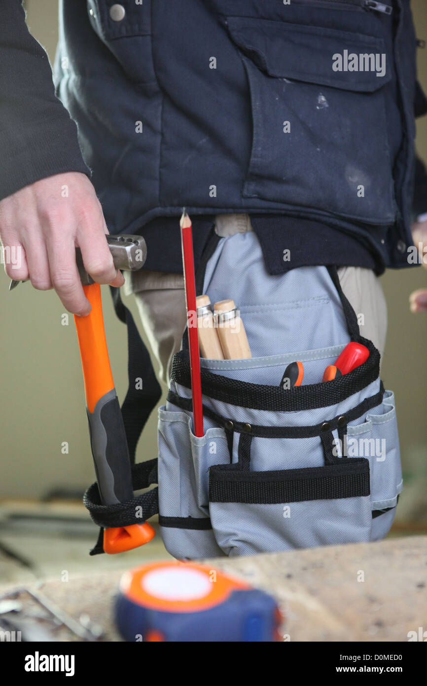 Tools in pocket of foreman Stock Photo - Alamy