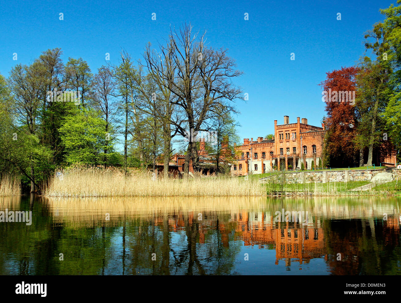 Old palace in Sorkwity, seen from Lampackie lake Stock Photo - Alamy