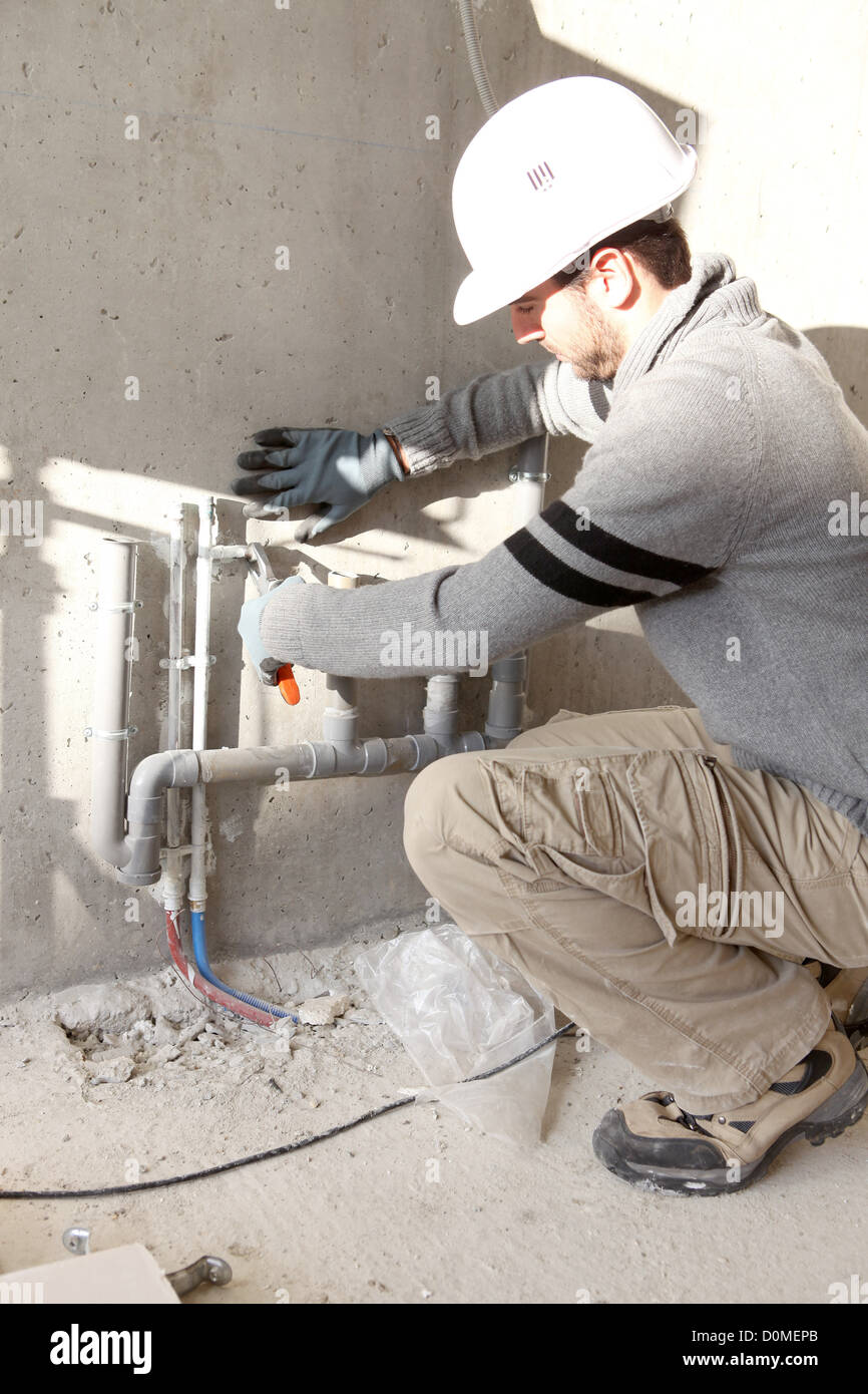 plumber at work outdoors Stock Photo - Alamy
