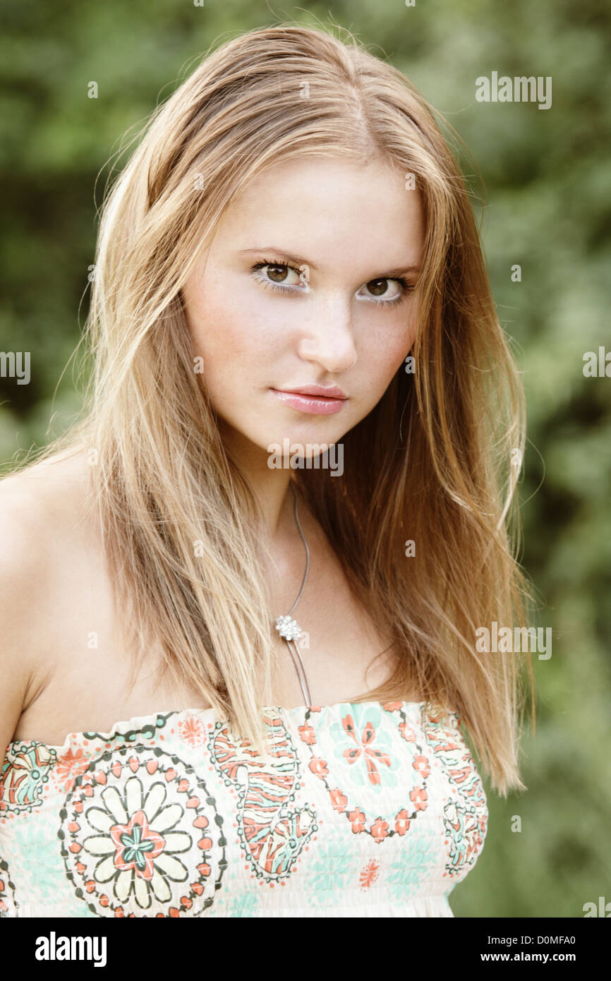 Pretty girl in sun-dress Stock Photo - Alamy