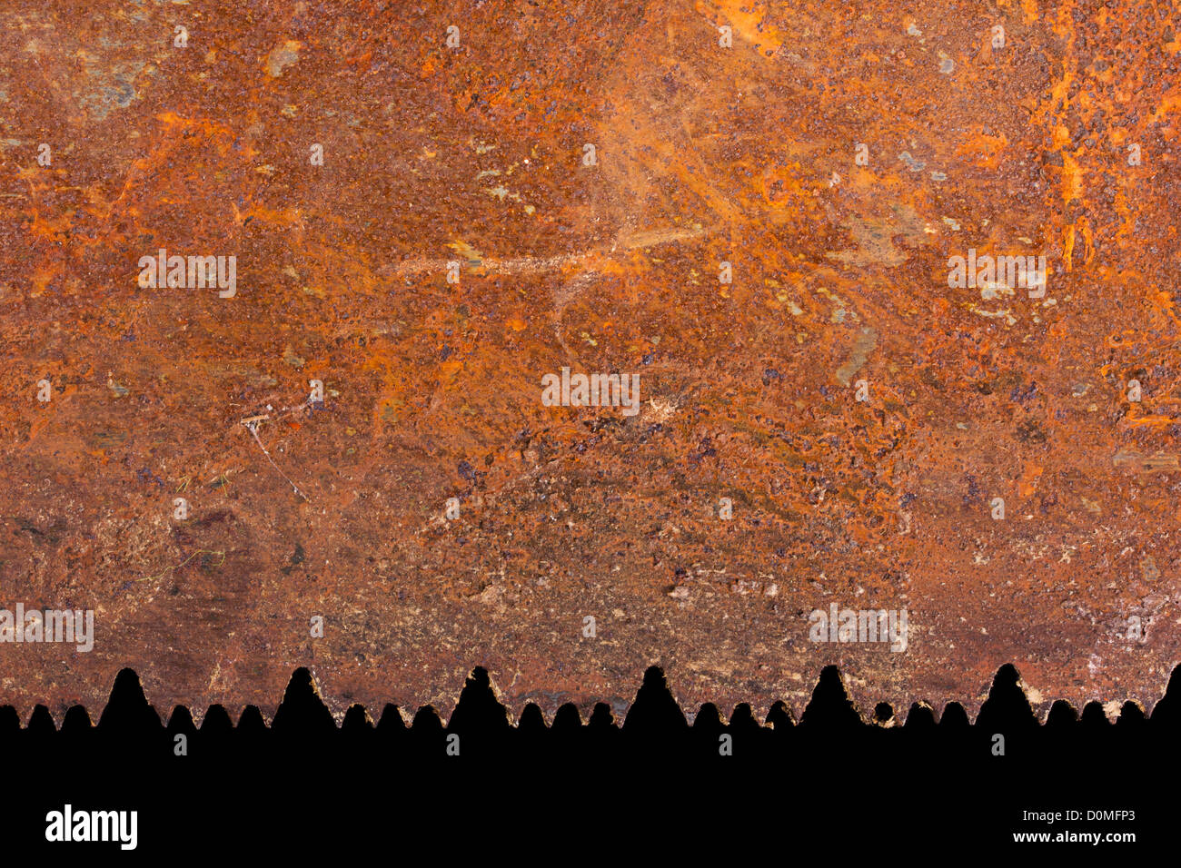 Rusty saw background on black Stock Photo - Alamy