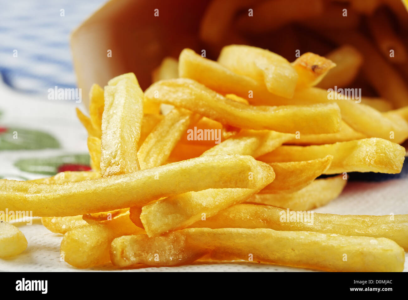 French fries scattered on table Stock Photo - Alamy