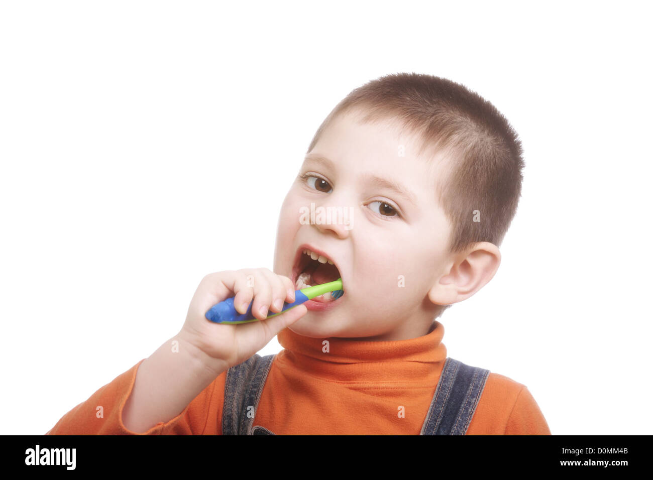 Kid brushing teeth Stock Photo - Alamy