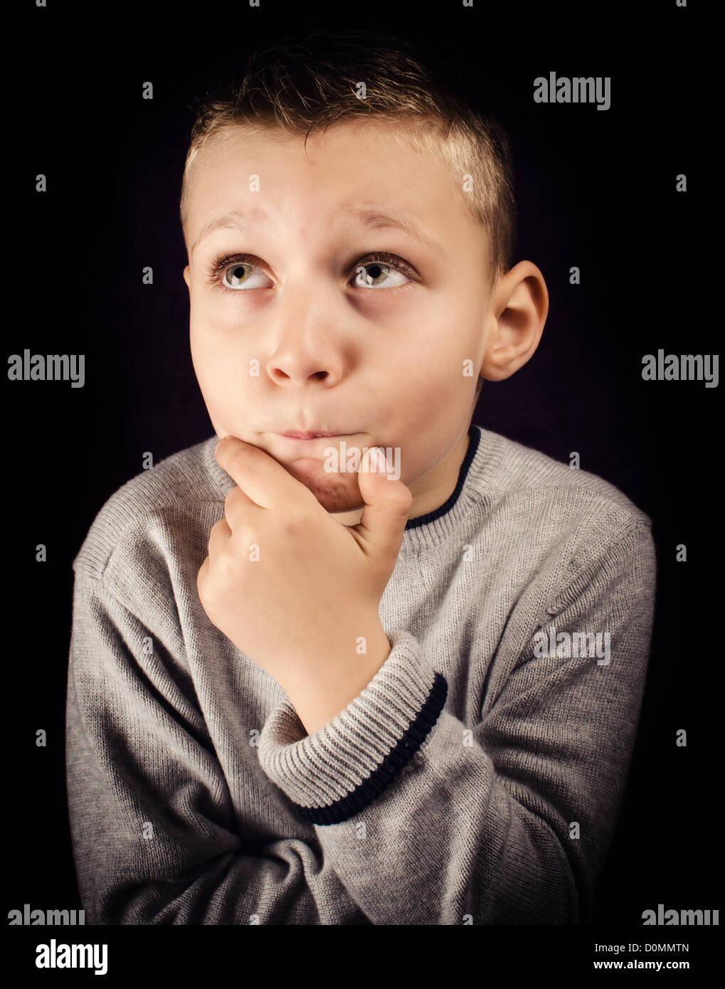 Boy concentration problem solving hi-res stock photography and images ...
