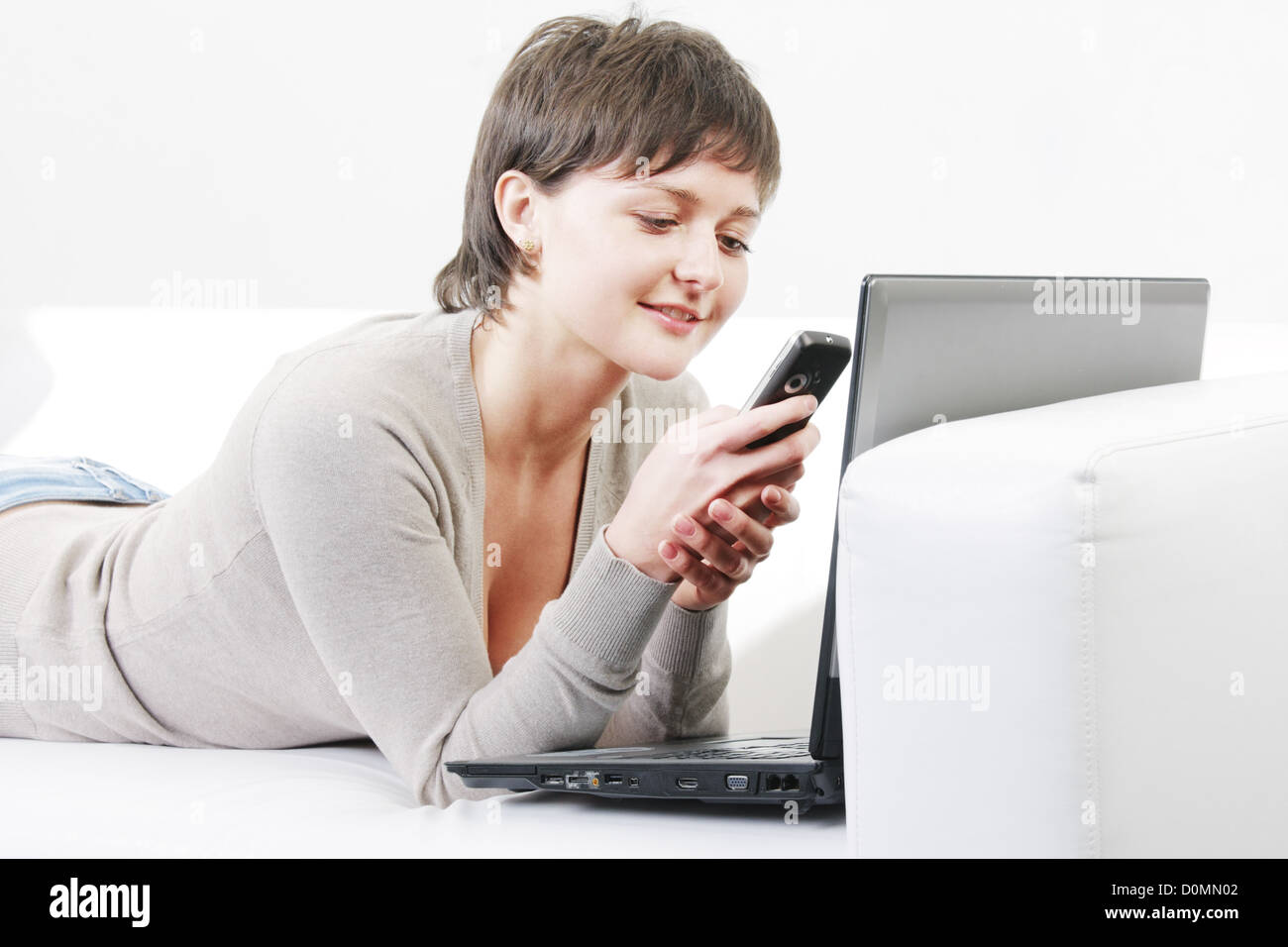 Woman reading message Stock Photo - Alamy