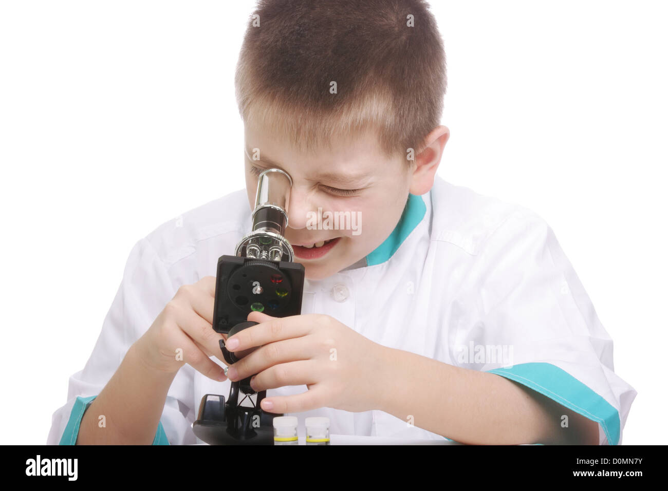 Kid looking into microscope Stock Photo - Alamy
