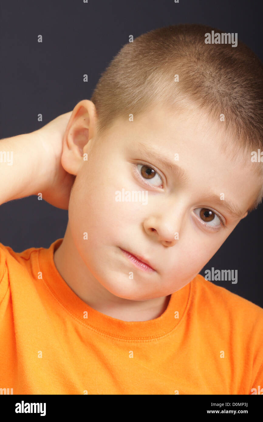Kid straight face hi-res stock photography and images - Alamy