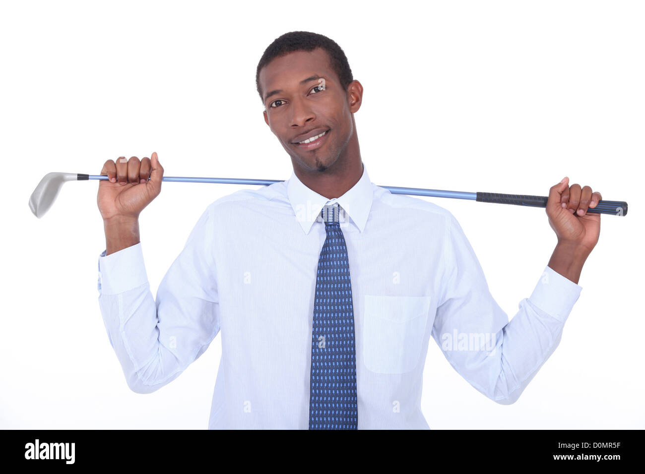 Man with golf club Stock Photo - Alamy