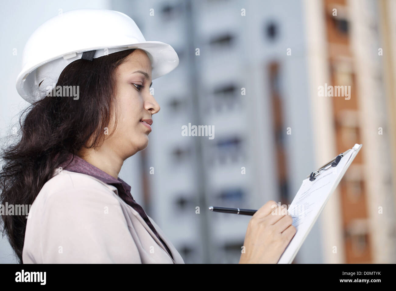Indian female construction engineer at work place Stock Photo - Alamy