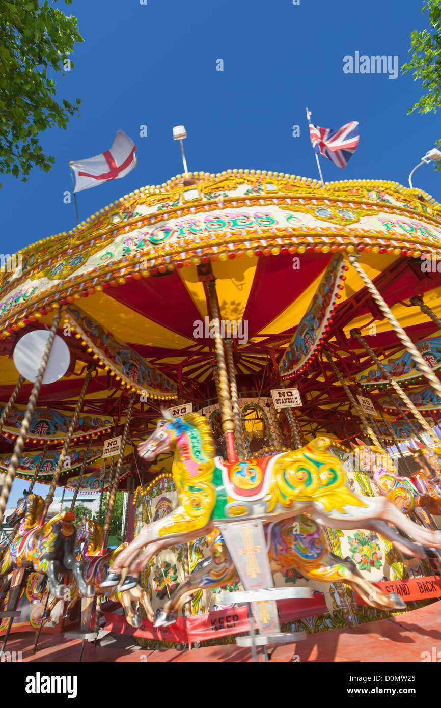 Colourful horse on a carousel fairground ride, UK Stock Photo - Alamy