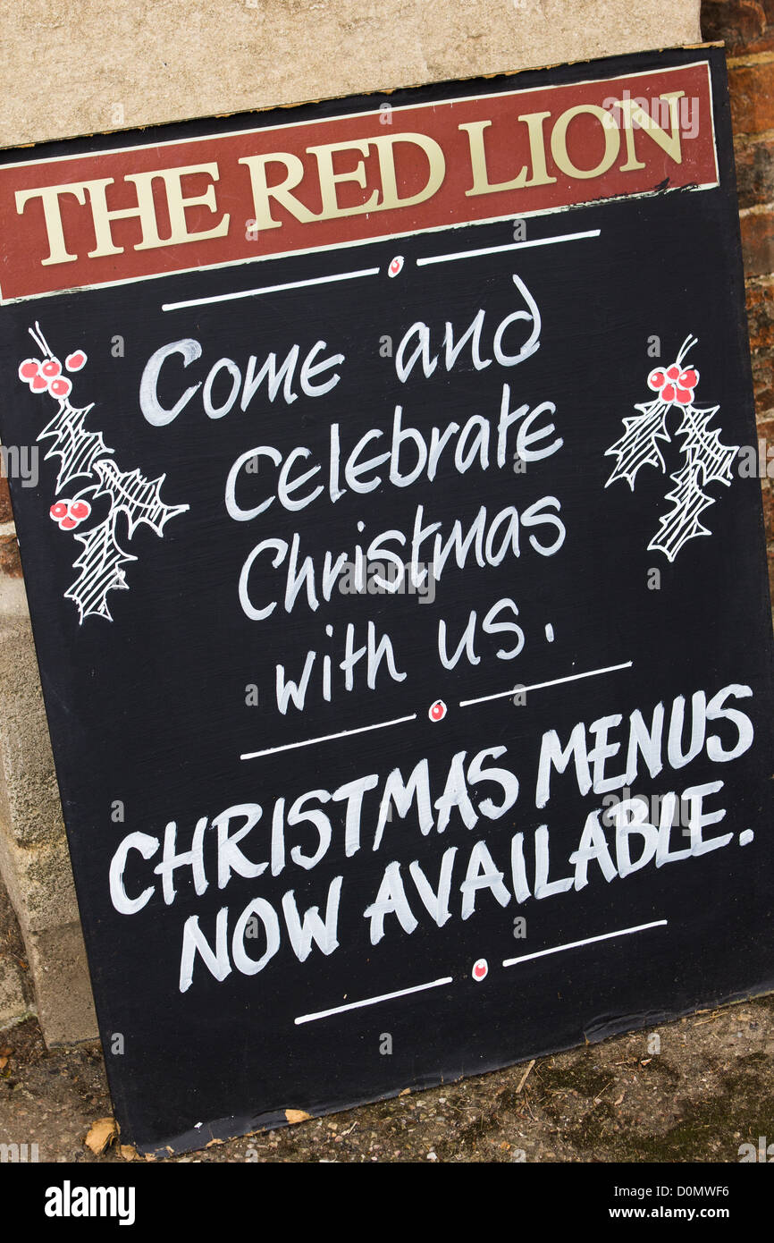 Pub sign England with Christmas invitation Stock Photo - Alamy