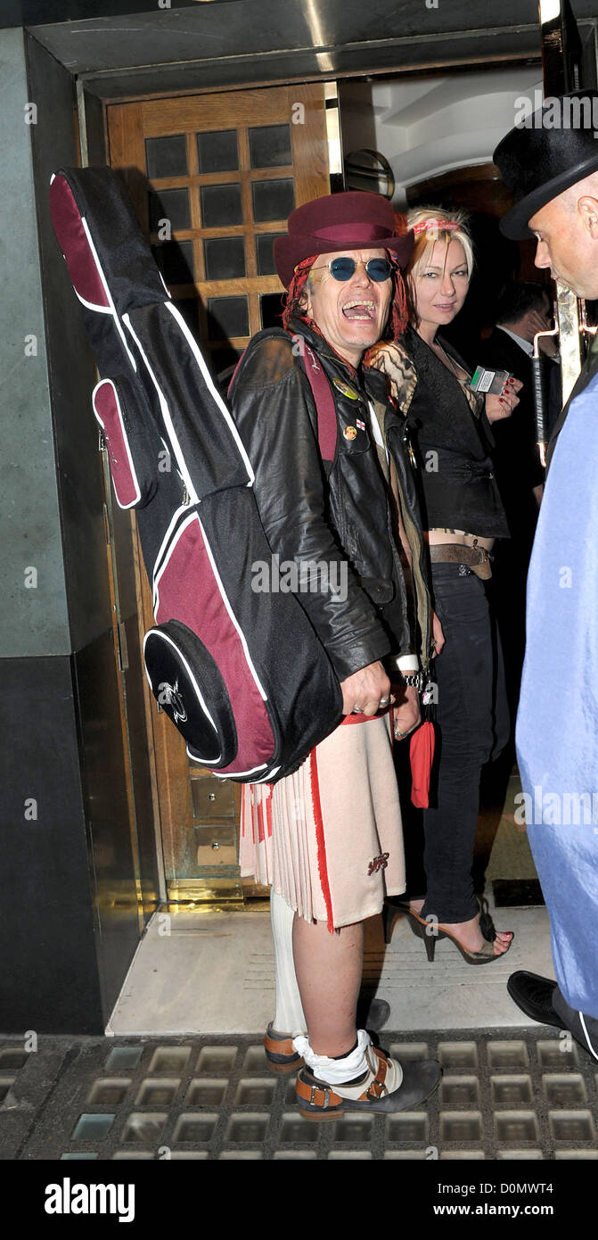 Adam Ant at the Ivy with new tattoos on his arm protected by cling film ...