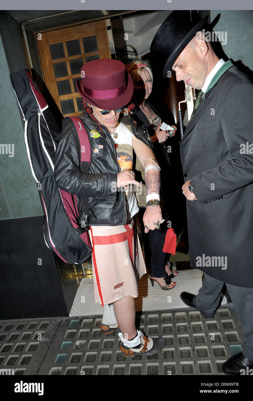 Adam Ant at the Ivy with new tattoos on his arm protected by cling film ...