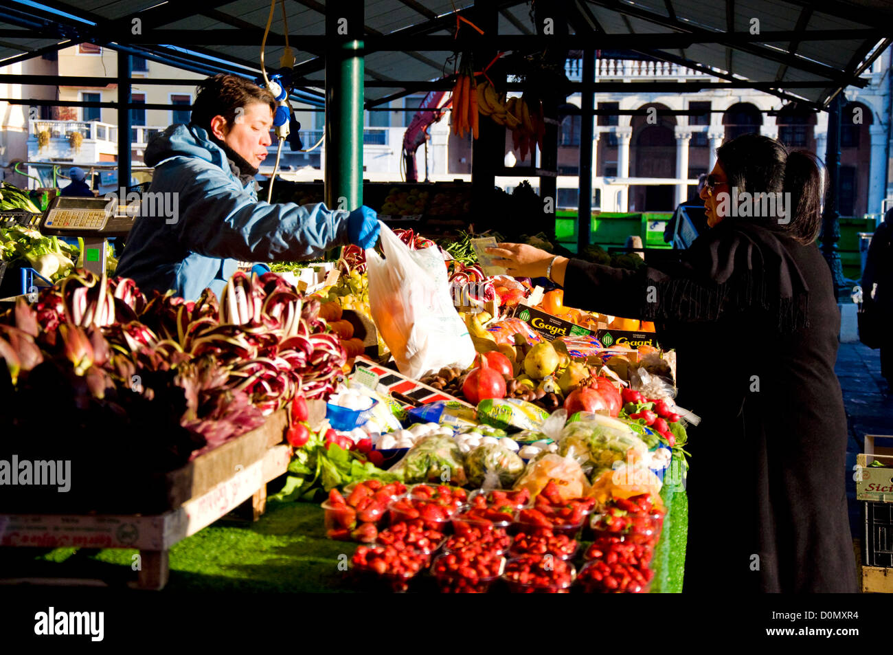 Shopping for fruit and vegetables in an outdoor market Stock Photo - Alamy