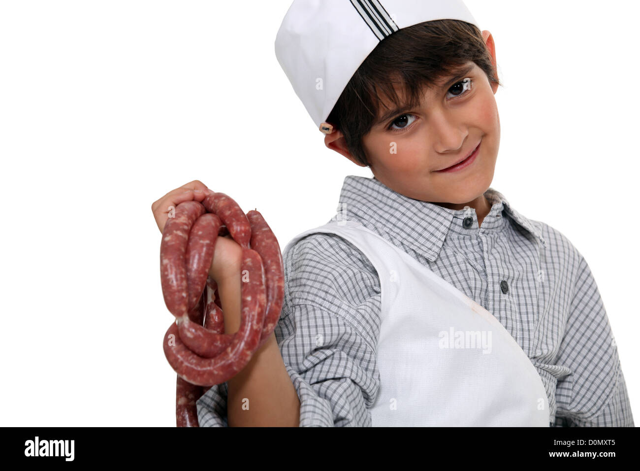 Small boy pretending to be butcher Stock Photo - Alamy