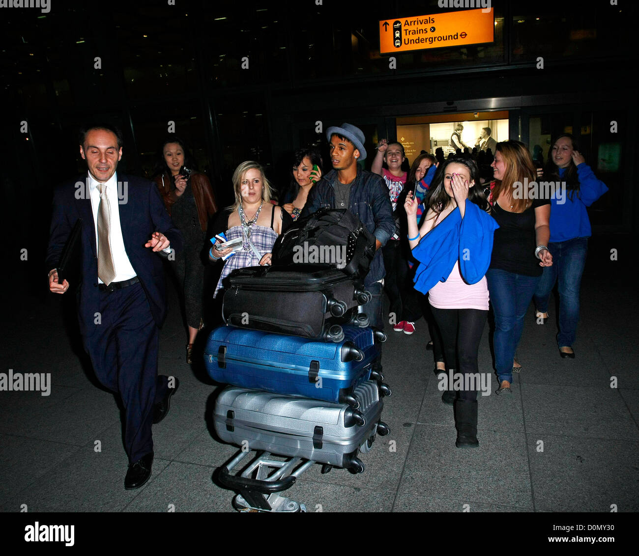 Jls arrive at heathrow airport london hi-res stock photography and ...