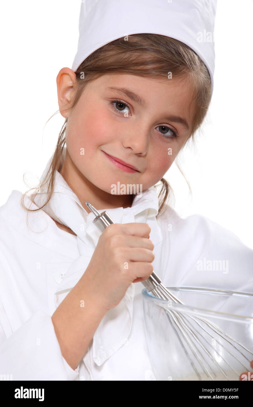 portrait of a little girl in baker clothes Stock Photo - Alamy