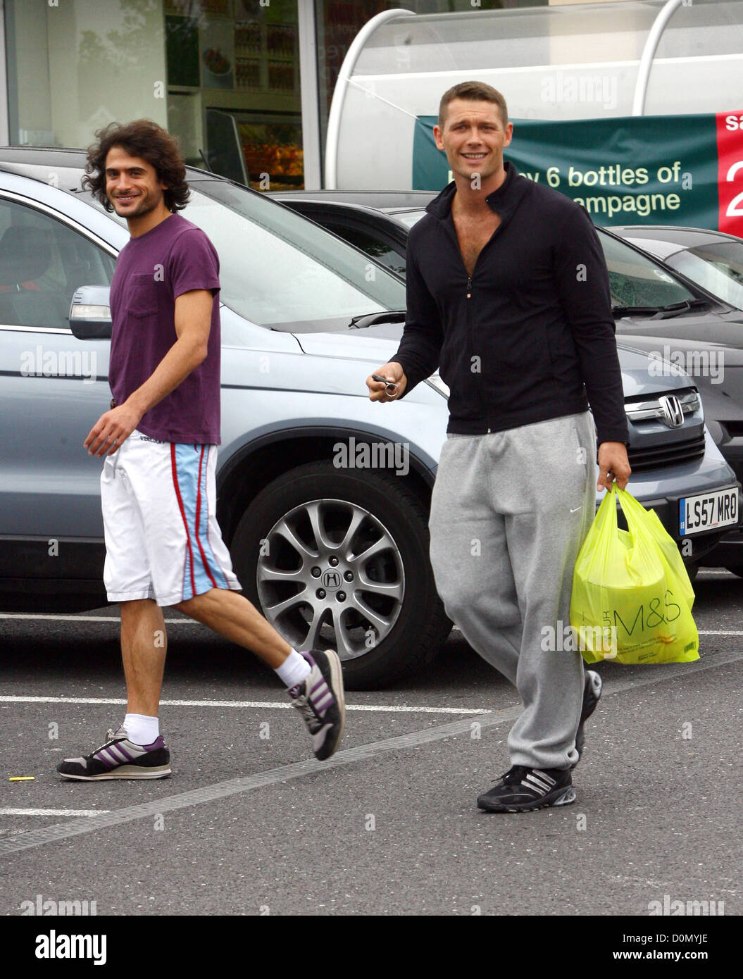 Marc Elliott and John Partridge take a break from filming 'Eastenders ...