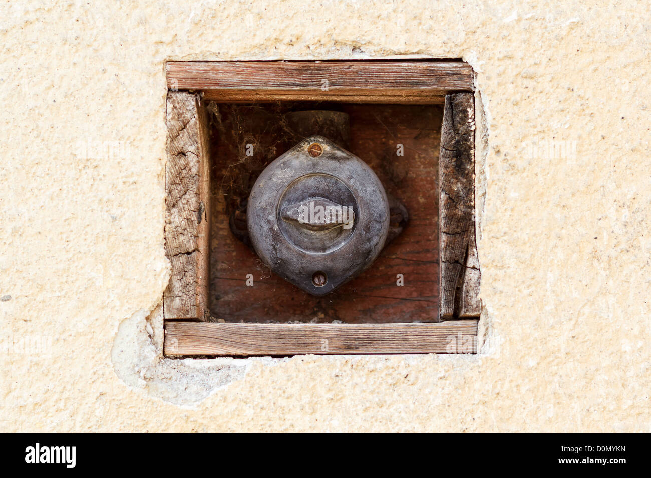 covered vintage retro light switch on house wall Stock Photo - Alamy