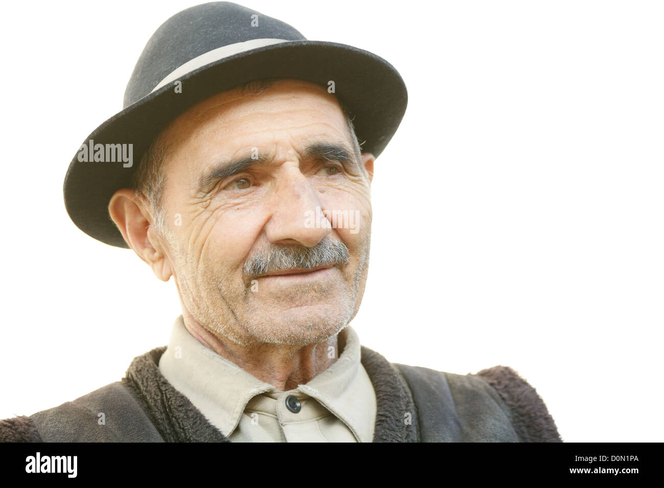 Portrait of elderly man looking sideways Stock Photo - Alamy