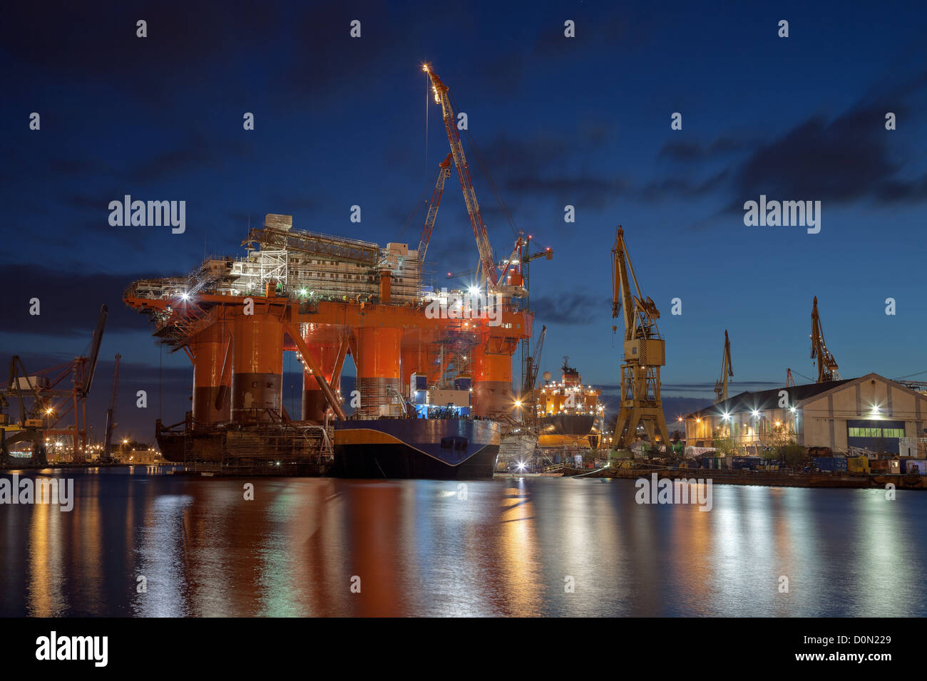 Repair of the oil rig in the shipyard Stock Photo - Alamy