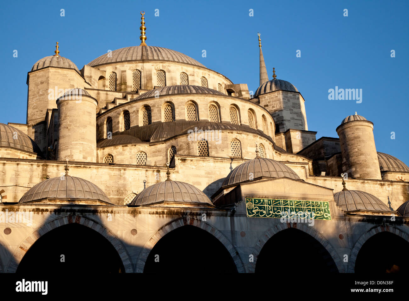 The Blue Mosque in the evening light viewed from inside the courtyard ...