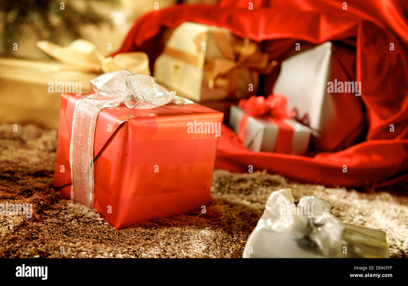 Arrangement with christmas gift box and sack full of presents Stock ...