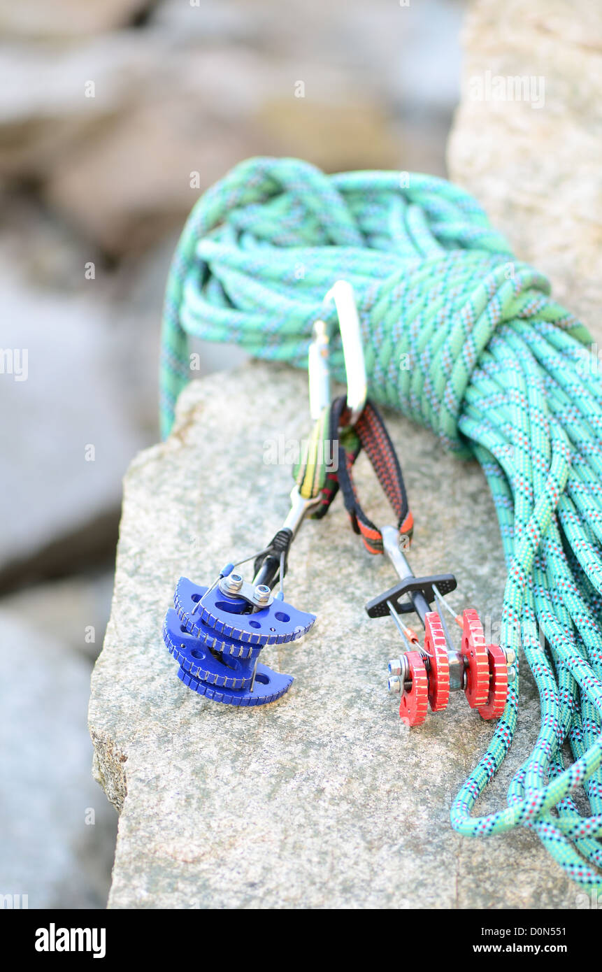 climbing rope and cams on a granit rock Stock Photo - Alamy