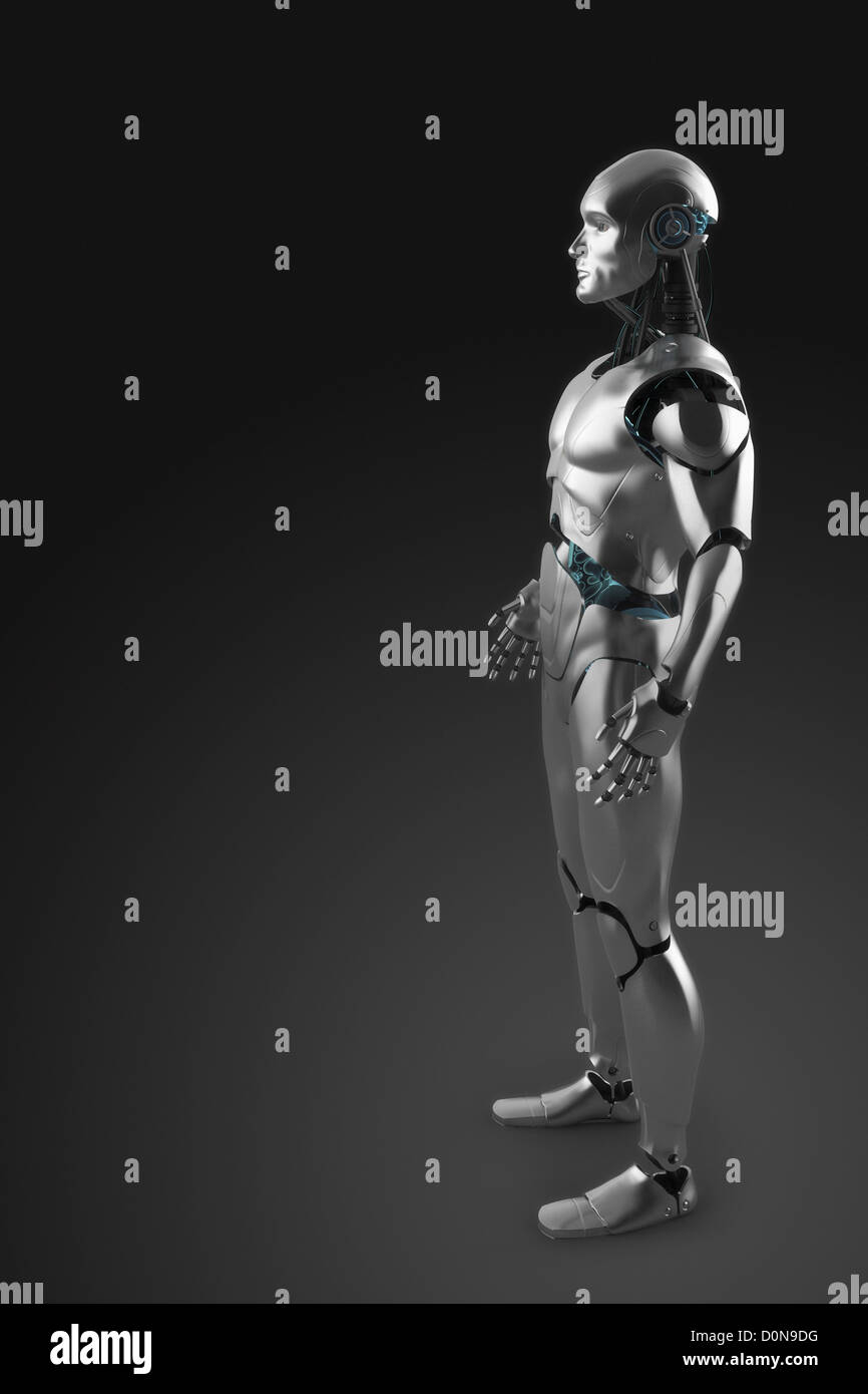 A male android standing against a gray backdrop Stock Photo - Alamy