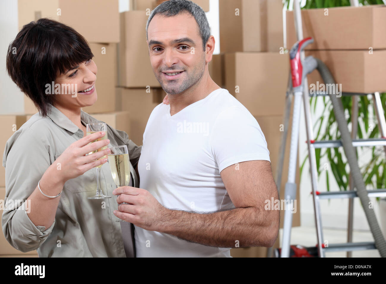 couple celebrating removal Stock Photo - Alamy
