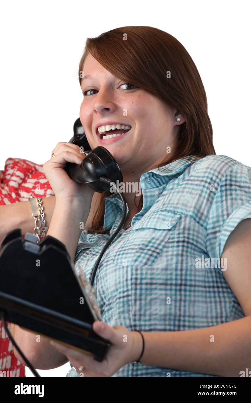 Happy girl with landline phone Stock Photo - Alamy
