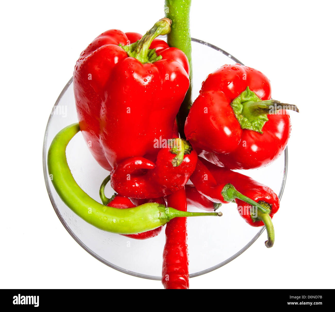 Red and green chili and bulgarian pepper in glass dish Stock Photo - Alamy