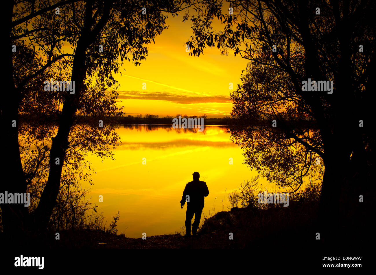 Silhouette at sunset Stock Photo - Alamy