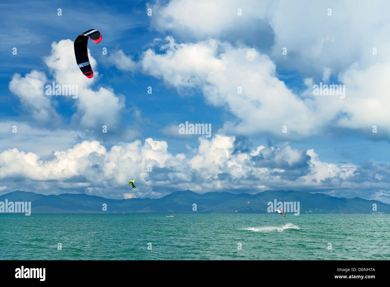 Wakeboarder jumping from water in open sea Stock Photo - Alamy