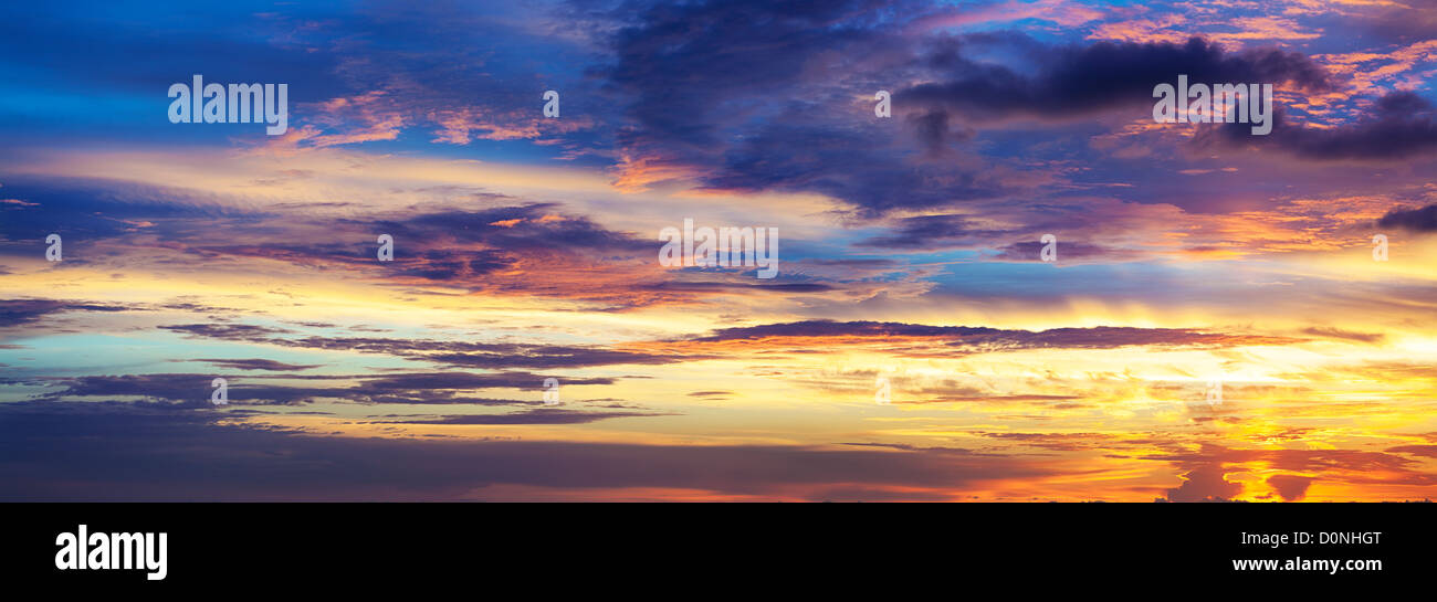 Spectacular sunset sky. Panoramic shot Stock Photo - Alamy
