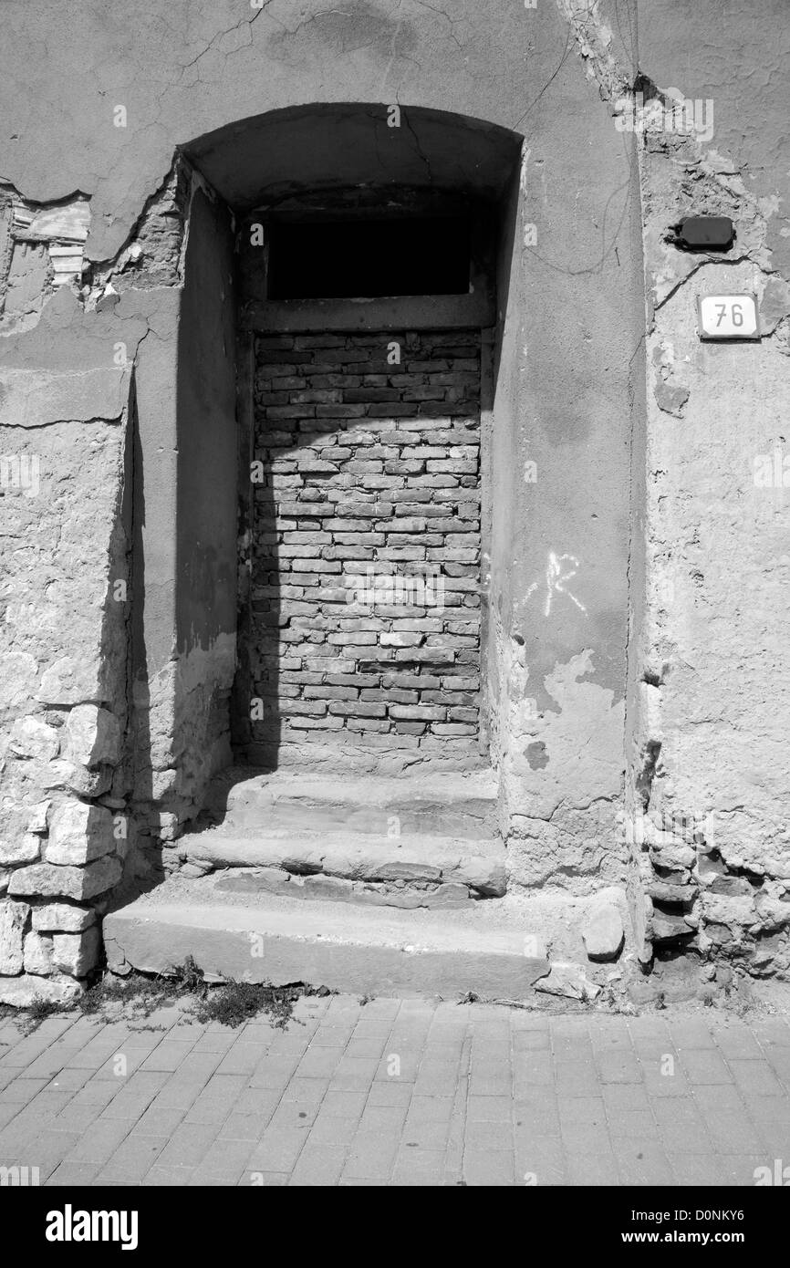 walled old door Stock Photo - Alamy