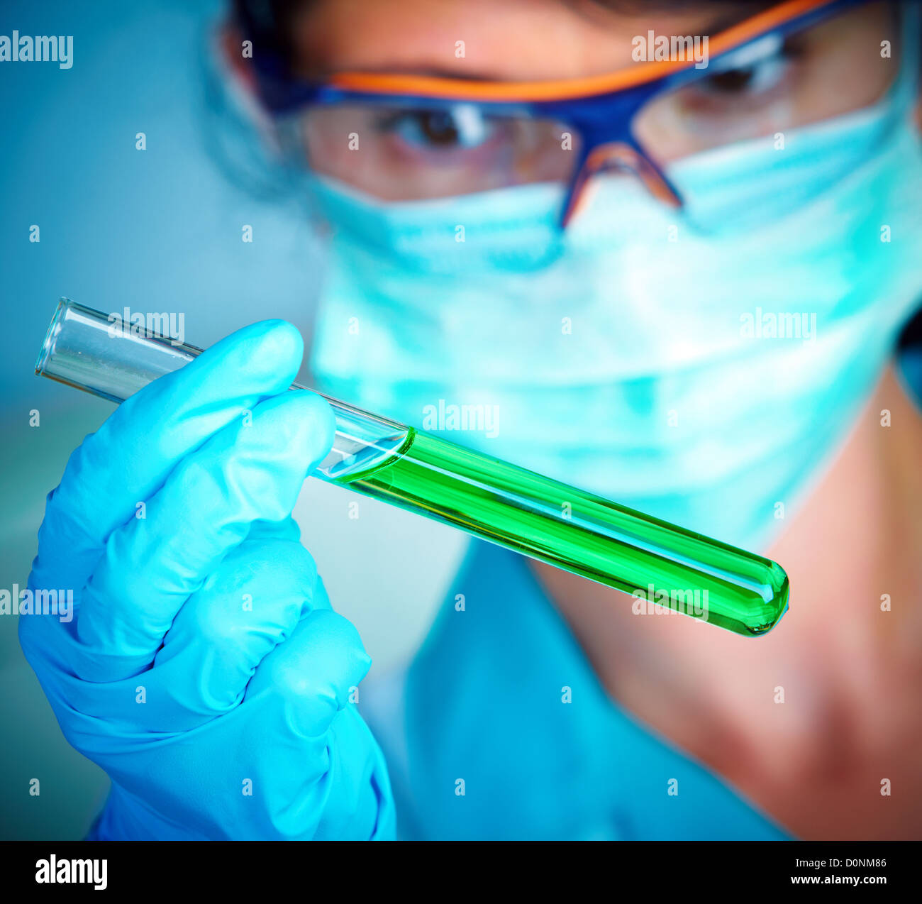 scientist in laboratory with test tubes Stock Photo - Alamy