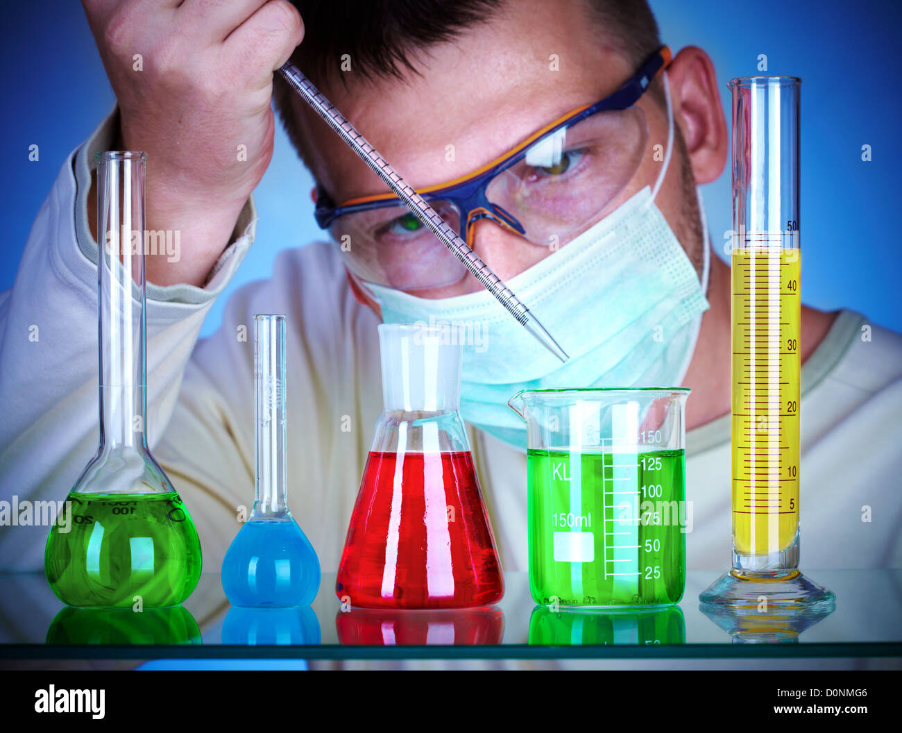 scientist in laboratory with test tubes Stock Photo - Alamy