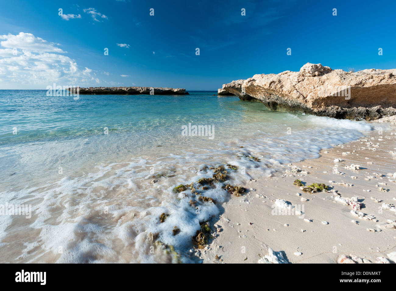 View from a beautiful tropical beach on a remote desert island with ...
