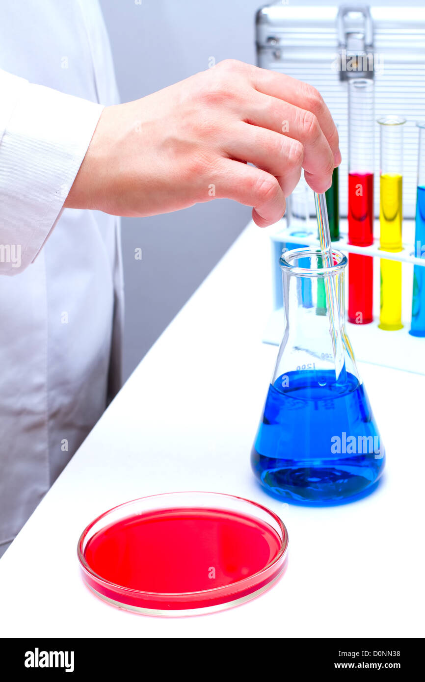 Chemistry Investigating Research Examining Testing Stock Photo - Alamy