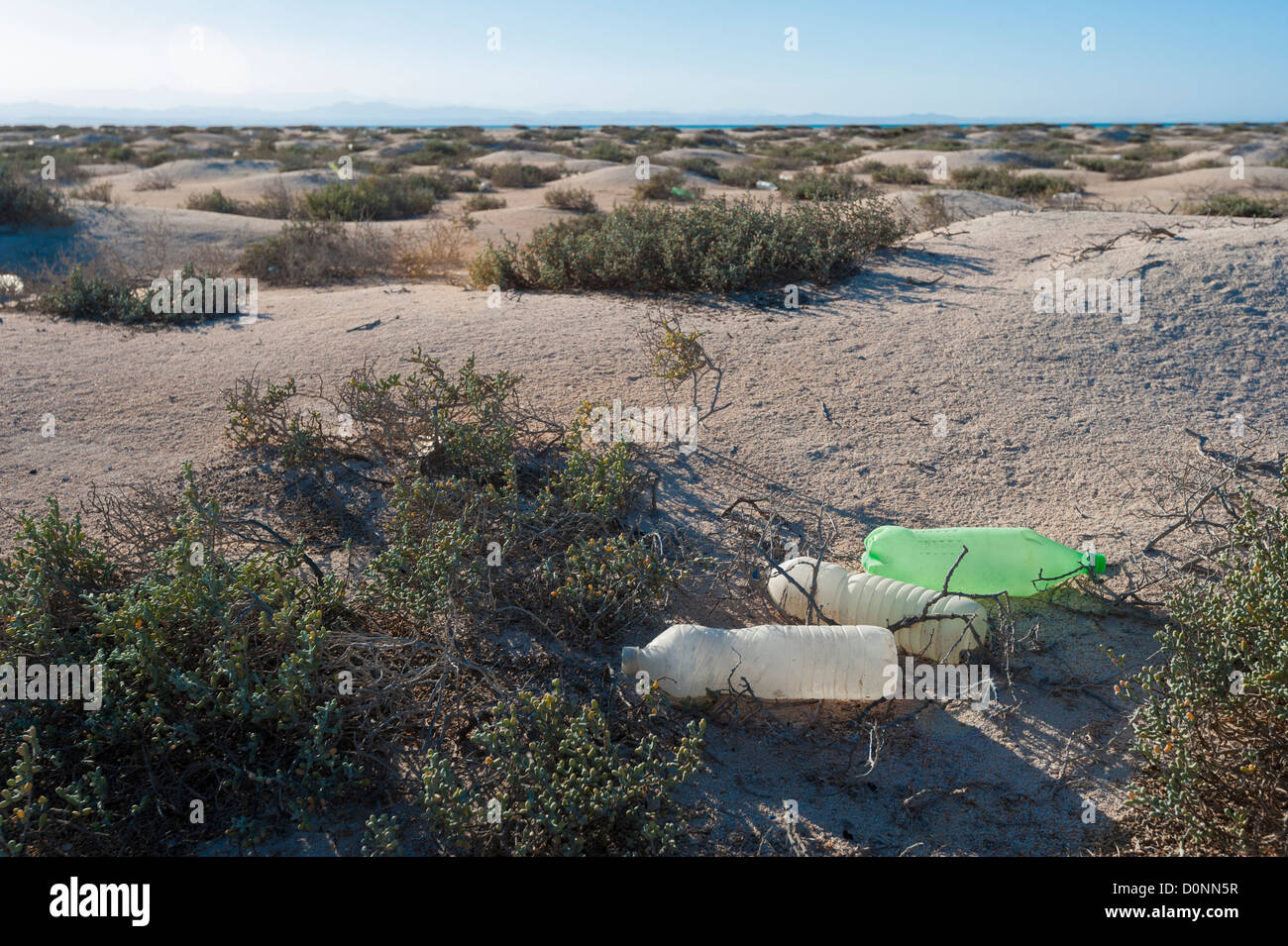 Old rubbish discarded on a remote desert island concept environmental ...