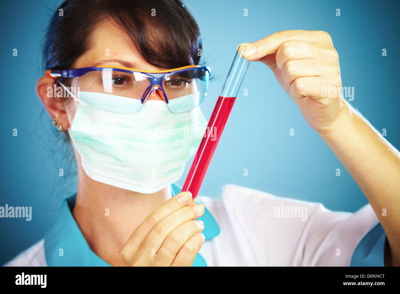 scientist in laboratory with test tubes Stock Photo - Alamy