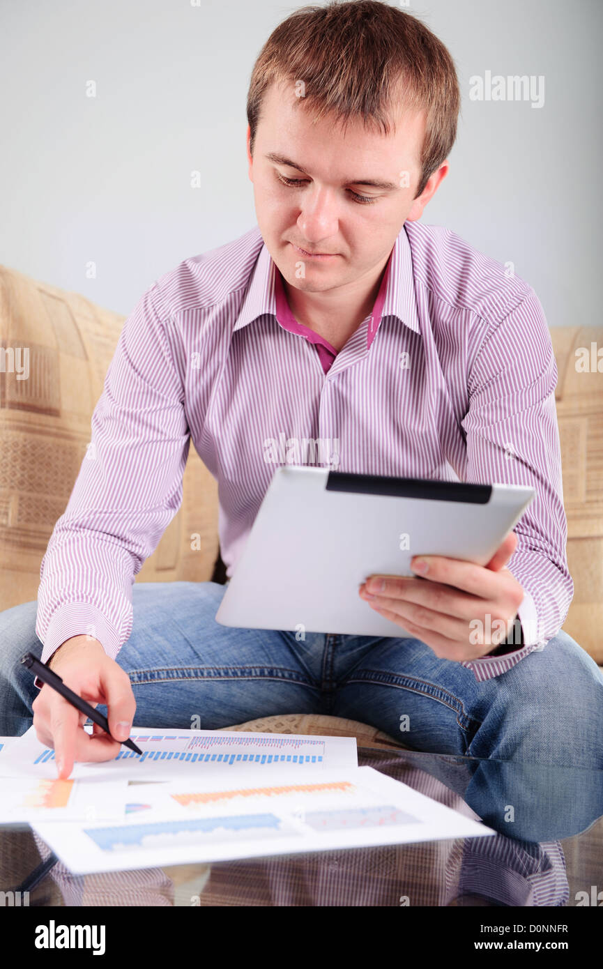 Concentrated businessman analyzing graphs hi-res stock photography and ...