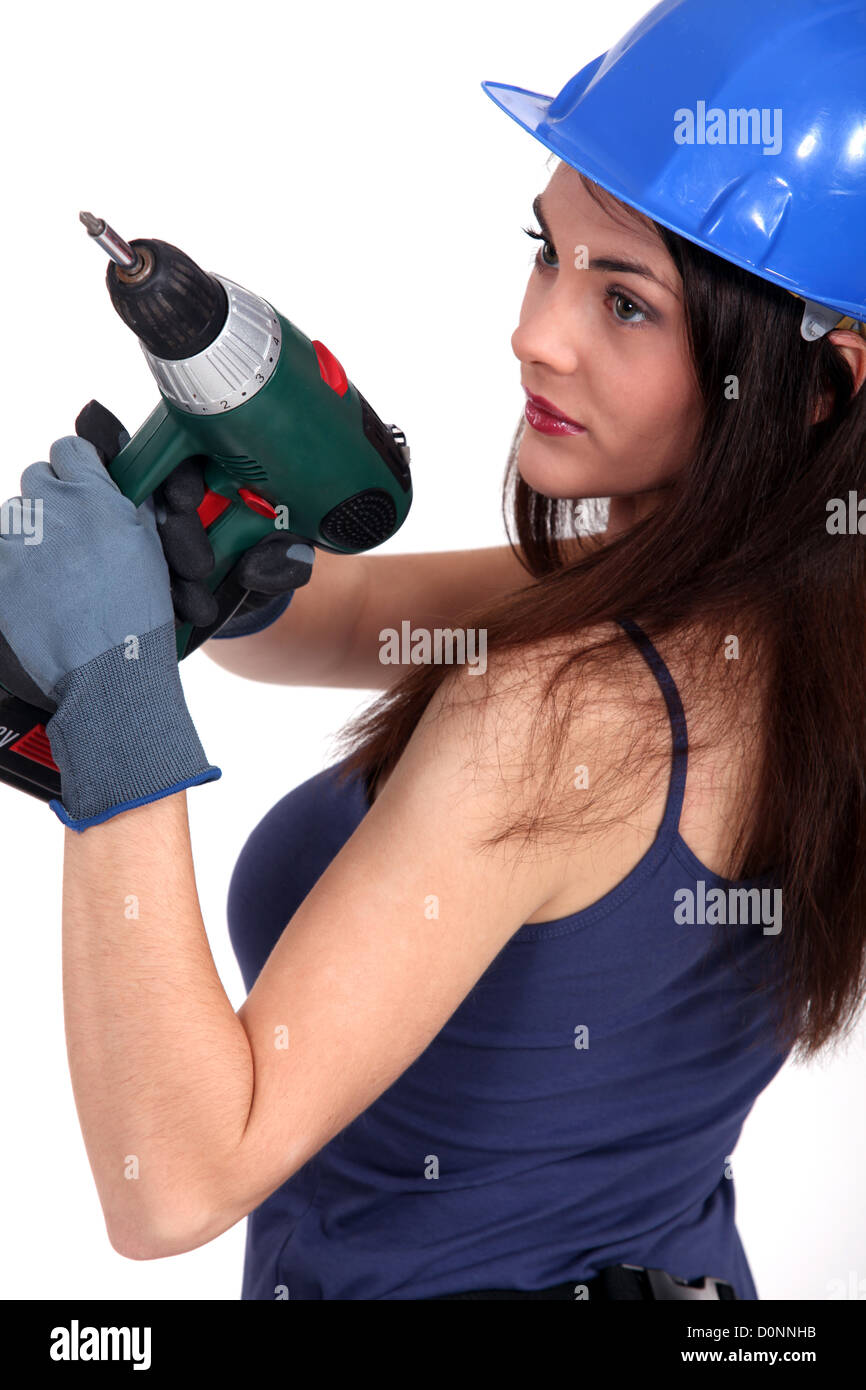 Woman with drill Stock Photo - Alamy