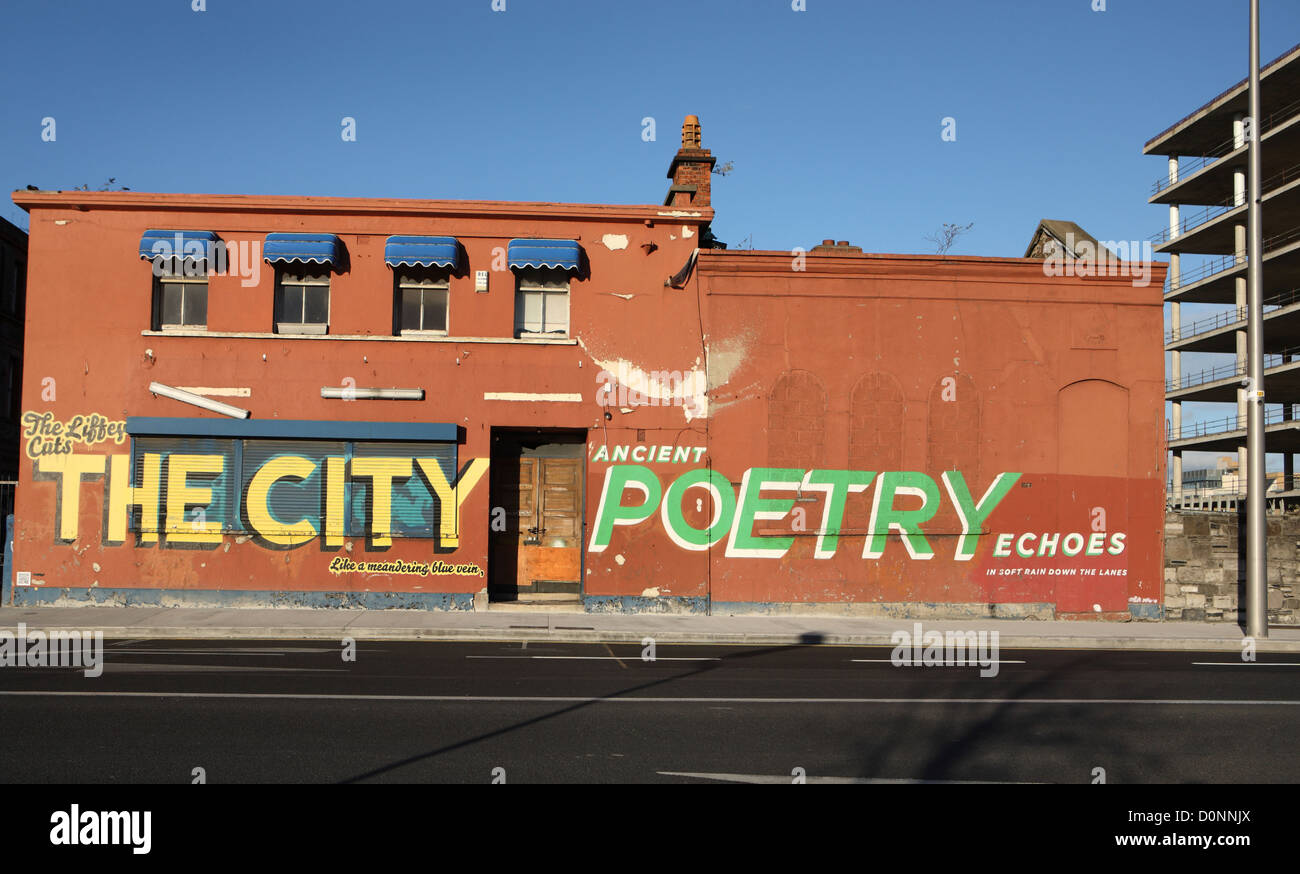 Poetry on building Dublin Ireland Stock Photo - Alamy
